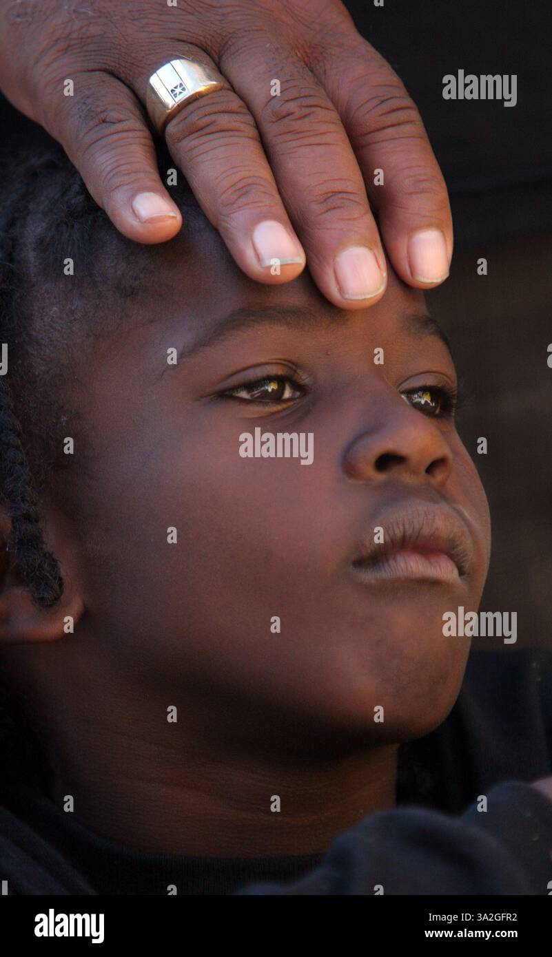 Nov 19, 2005; San Quentin, CA, USA; A boy listens while Rap star Snoop ...