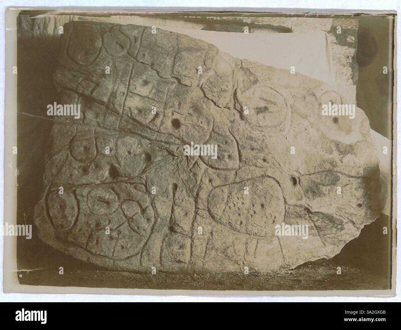 A photograph of the engraved slab of Saint-Bélec, taken in 1901 by Paul ...