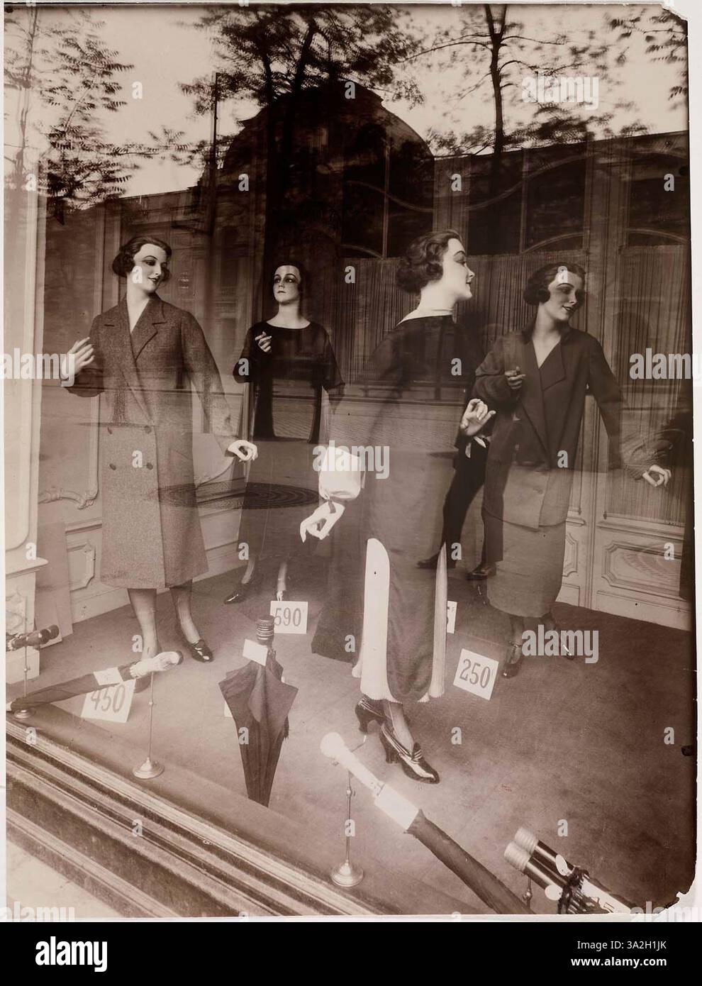 In this photograph, Eugène Atget captures a Parisian window display ...