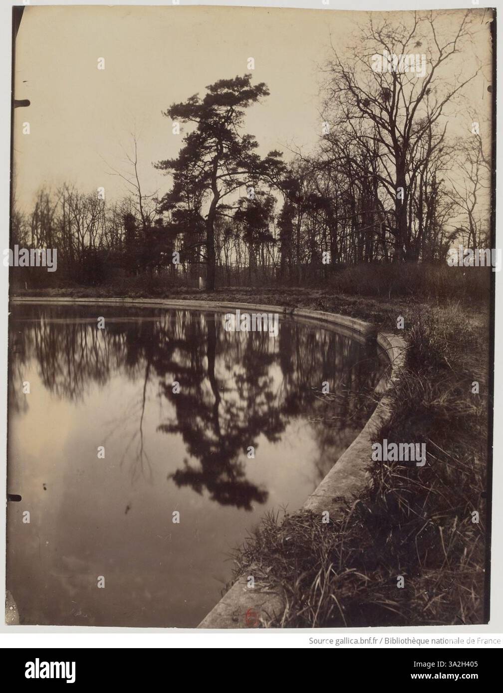 In this photograph, Eugène Atget depicts the symmetrical layout of Parc ...