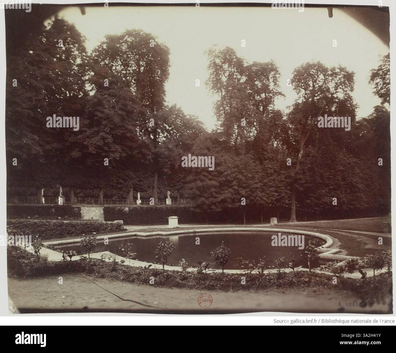 This image by Eugène Atget features St. Cloud park, emphasizing its ...