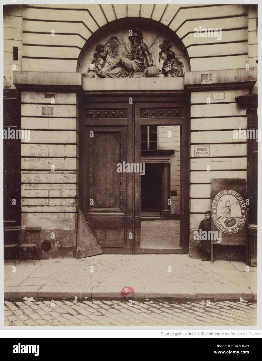 In this photograph, Eugène Atget captures the door at 136 Rue Amelot ...