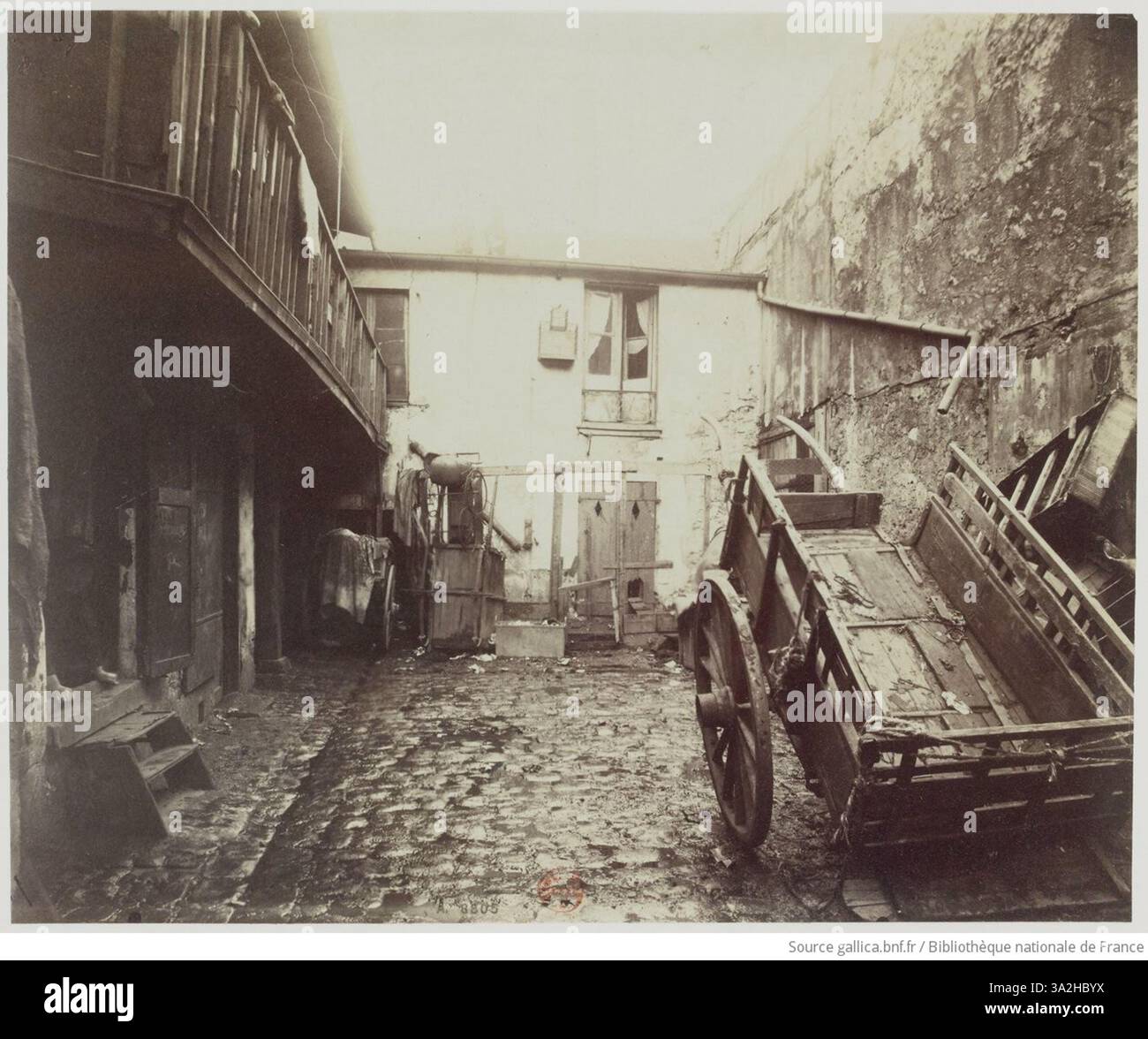 Eugène Atget's photograph from 1913 shows ragpickers in the Passage ...