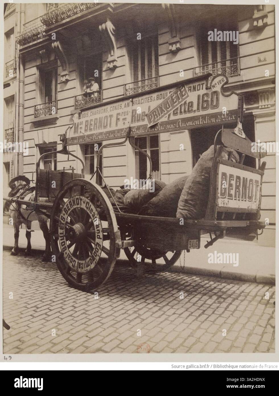 Eugène Atget’s 1910 photograph shows a coal transport cart used by ...