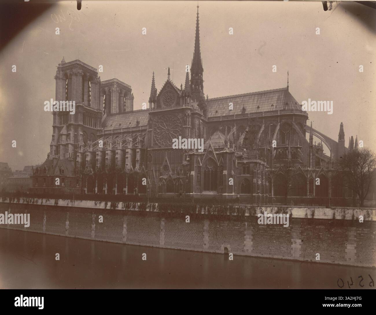 In this 1925 photograph, Eugène Atget captures the iconic Notre-Dame ...