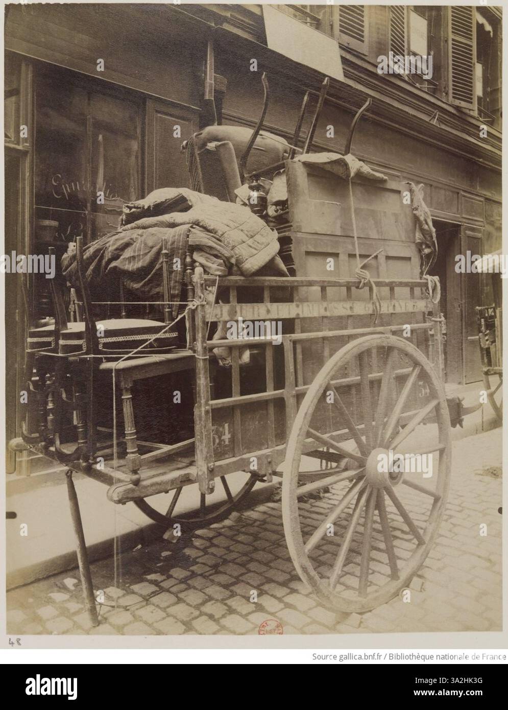 This 1910 image by Eugène Atget shows a smaller moving cart used for ...