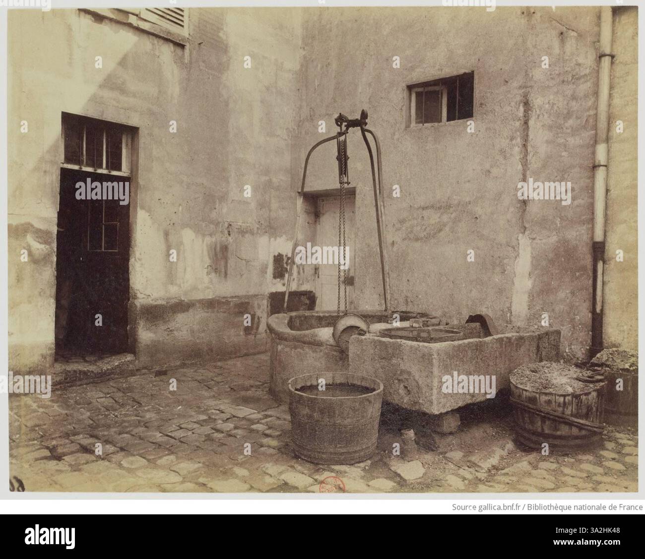 This photograph by Eugène Atget depicts the courtyard of the Duplessis ...