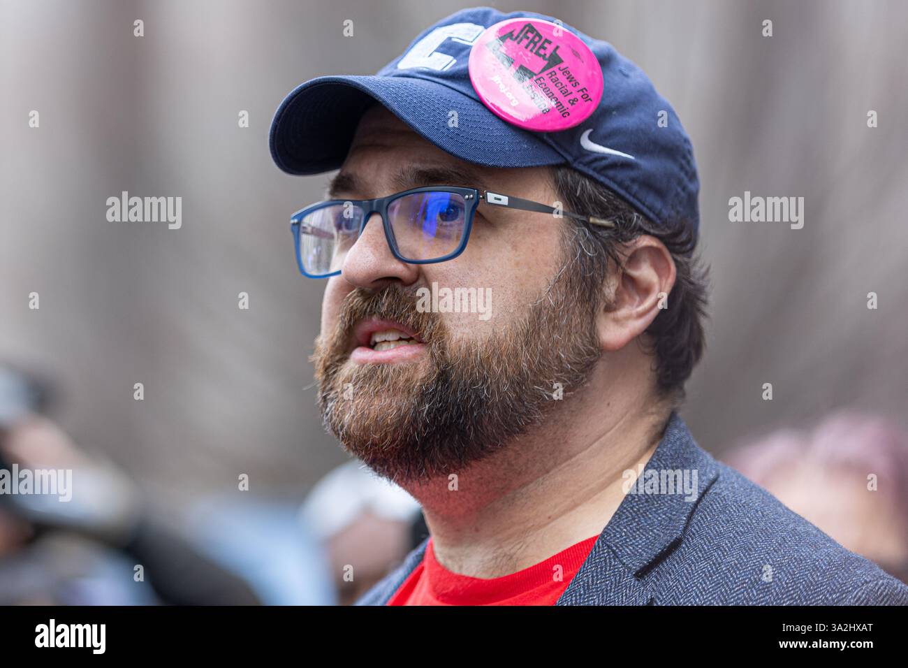Joseph Howley, a professor at Columbia University, speaks to the media ...