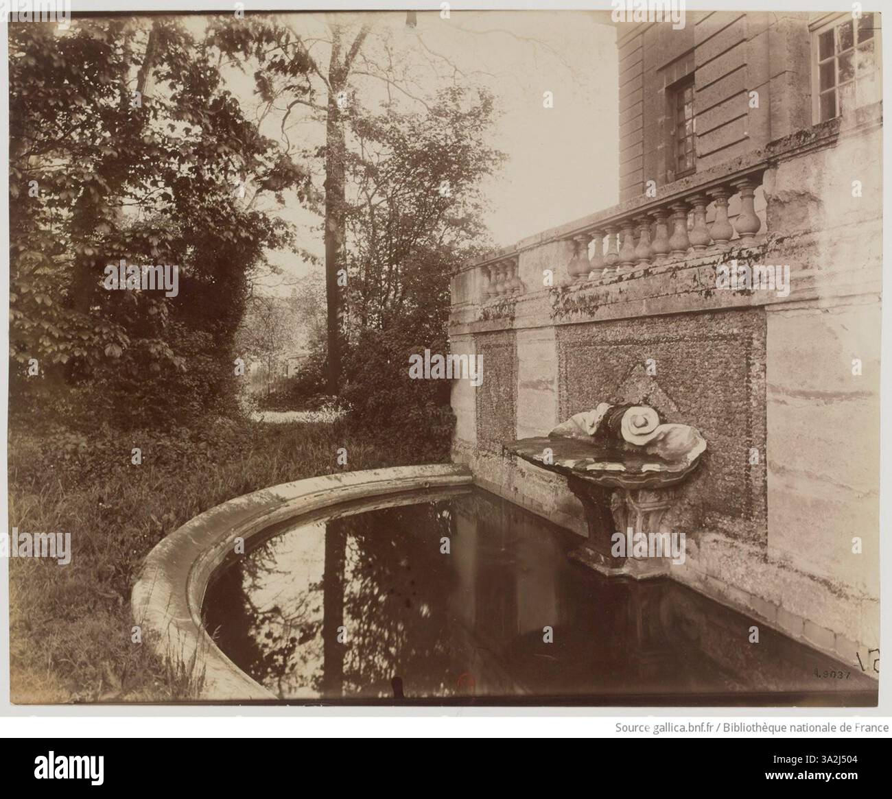 A photograph by Eugène Atget showing the elegant formal gardens of Parc ...