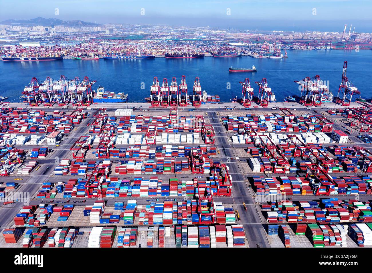 A working scene of a foreign trade container terminal at Qingdao Port ...