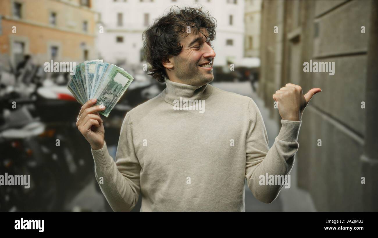 Hispanic man outdoors in city holding bangladesh taka and pointing to ...
