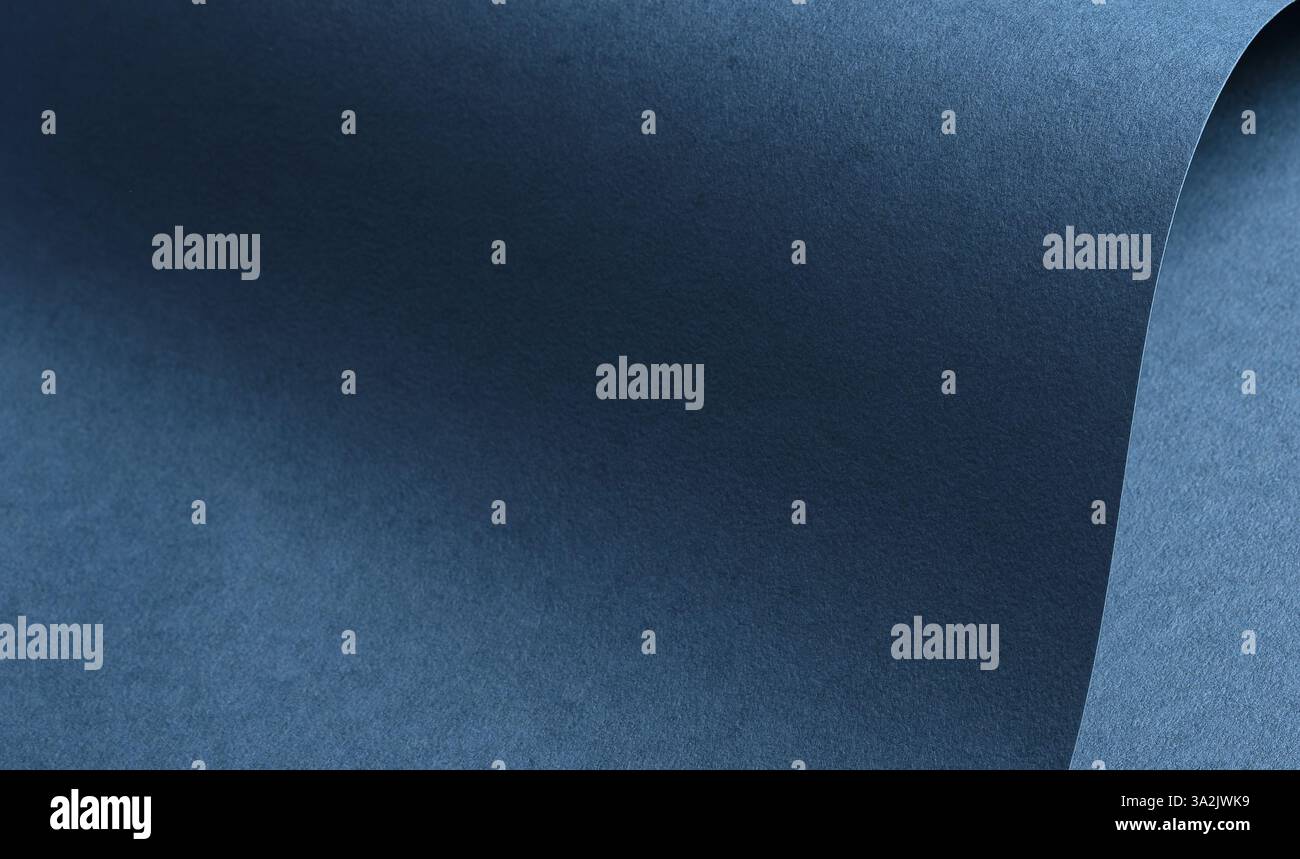 Deep navy blue paper background with a matte texture and subtle ...