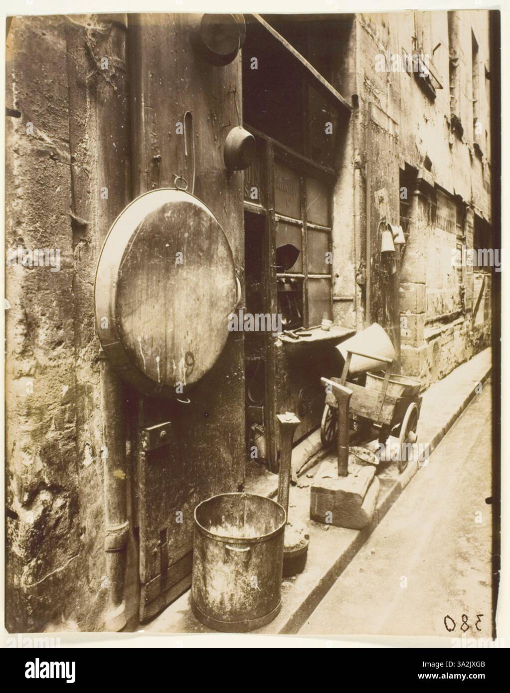 Atget's photograph of Rue de la Reynie shows a quiet Parisian street ...