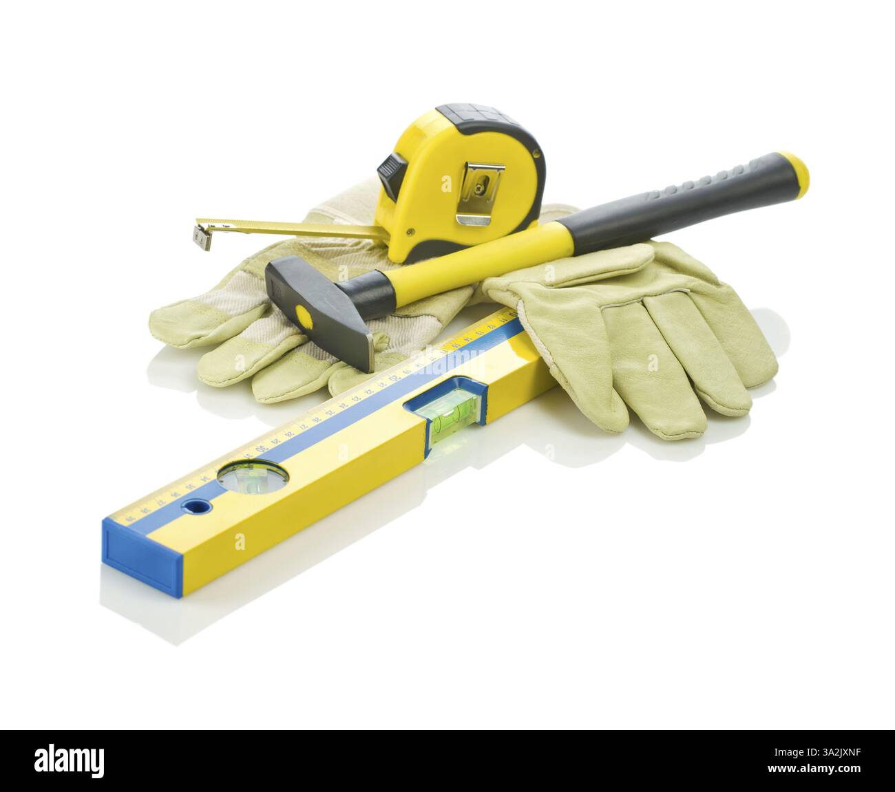 Tapeline, level, gloves and hammer Stock Photo - Alamy