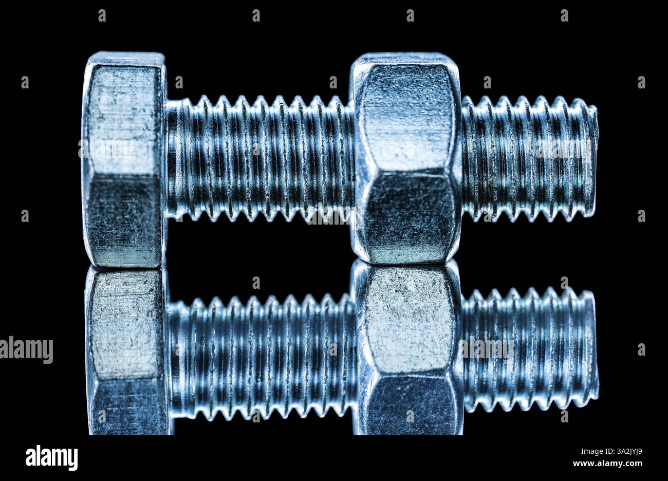 Threaded construction nut screwbolt on black background Stock Photo - Alamy