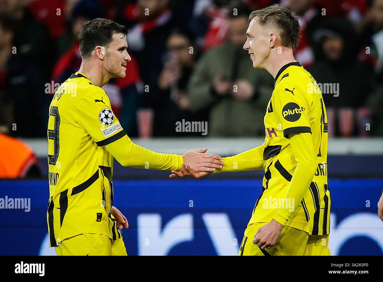 Maximilian BEIER of Borussia Dortmund celebrate his goal with Pascal ...