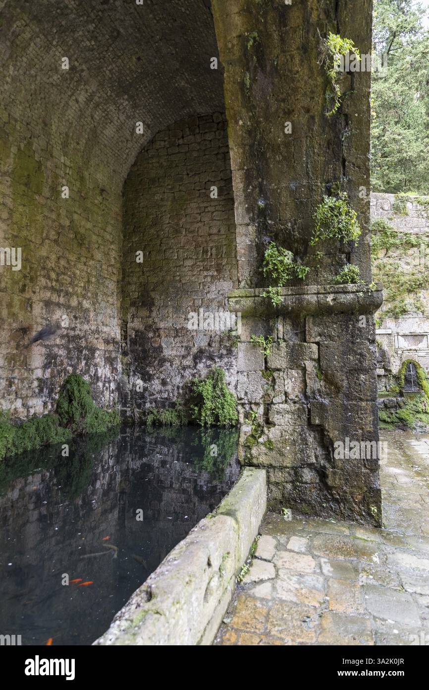 Old covered water basin at the Porta Docciola city gate, Volterra ...
