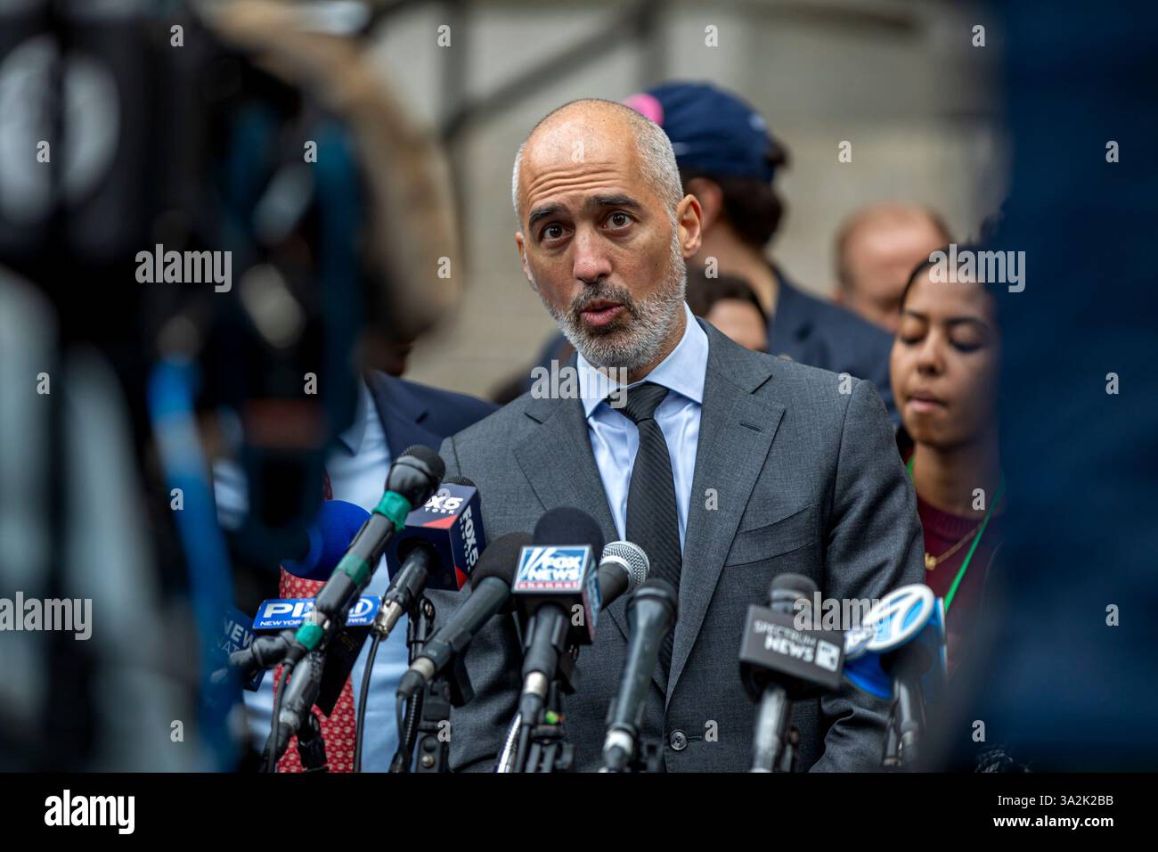 Ramzi Kassem, attorney for Mahmoud Khalil, speaks to members of the ...