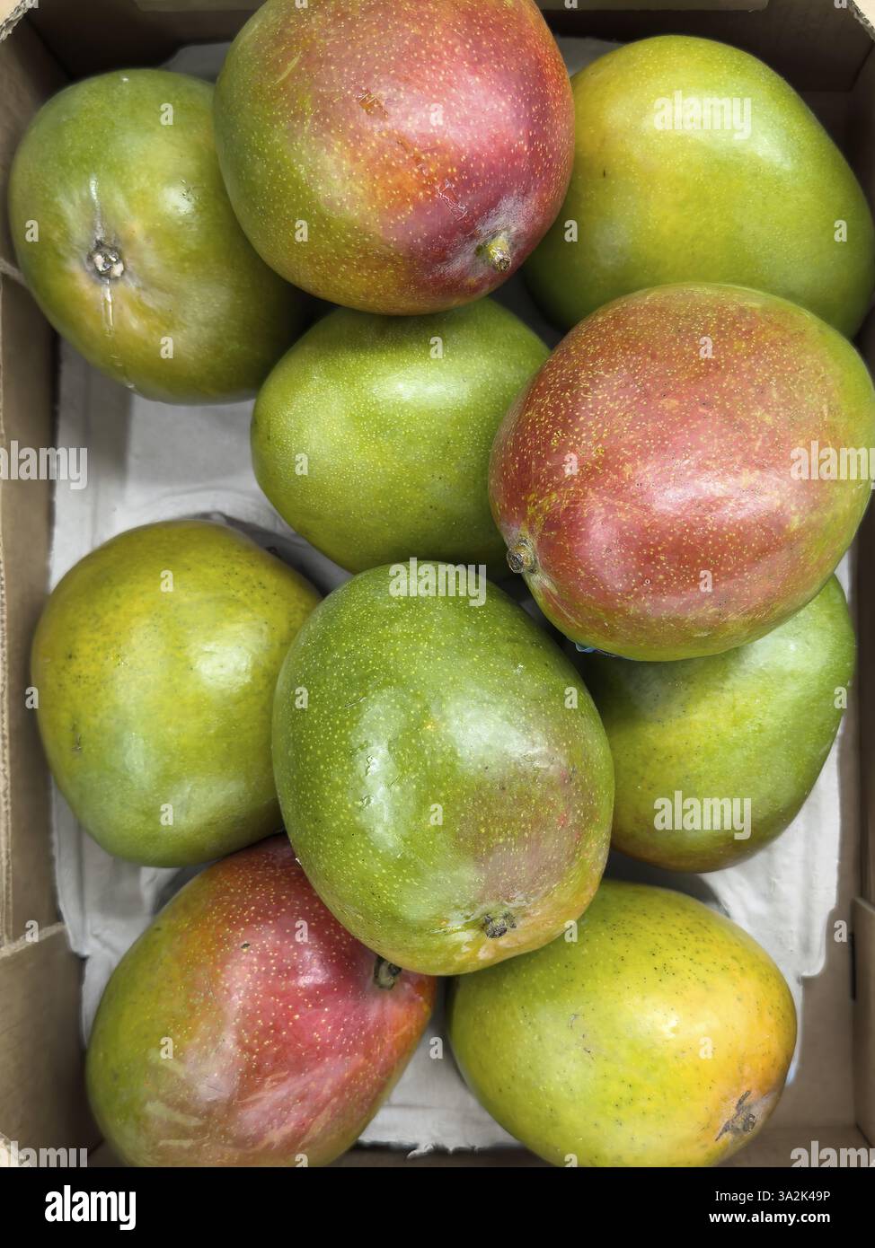Natural organic fruit mango in loose pieces Display of retail wholesale ...