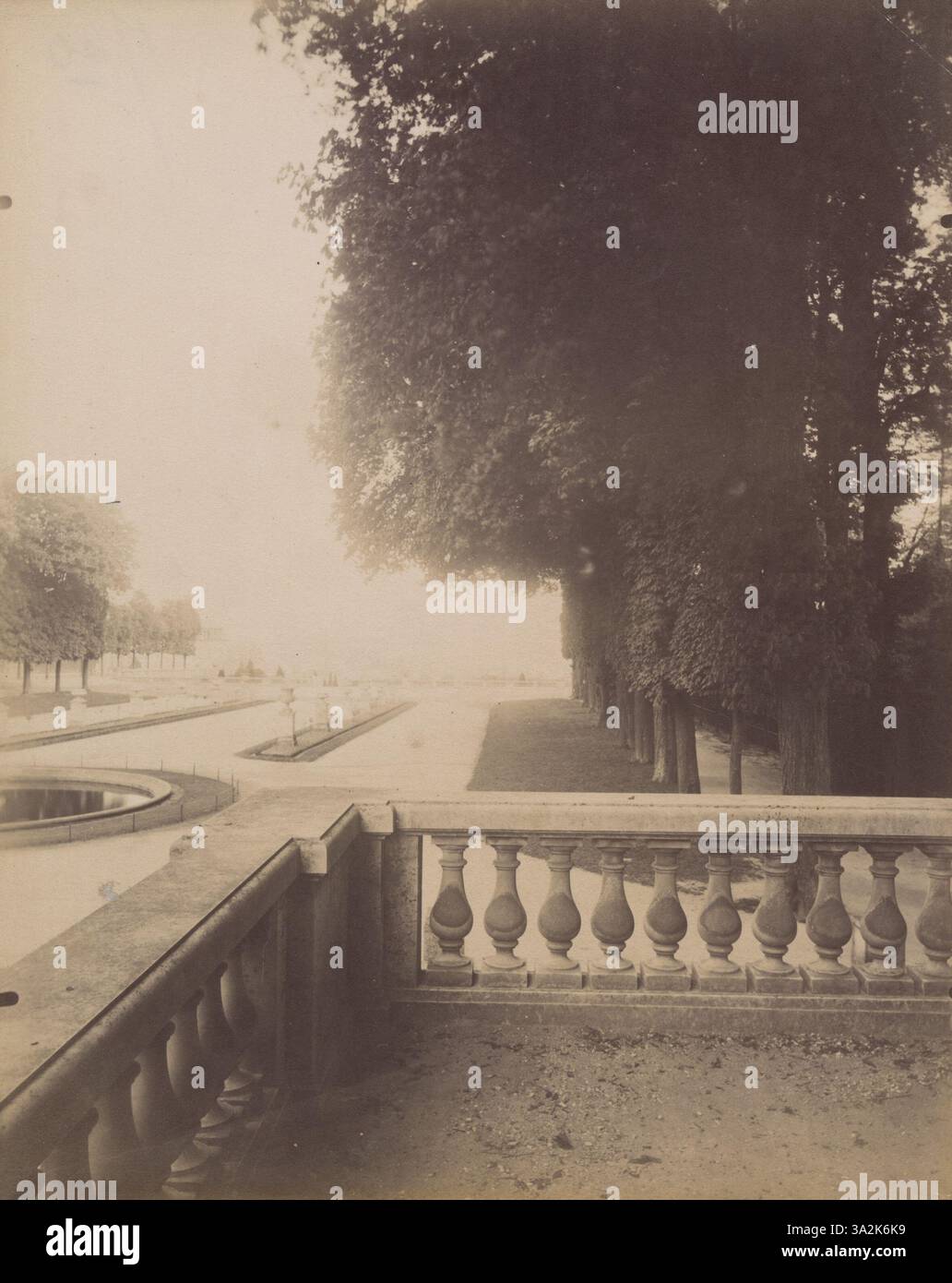 This 1915-19 photograph by Eugène Atget showcases a tranquil scene from ...