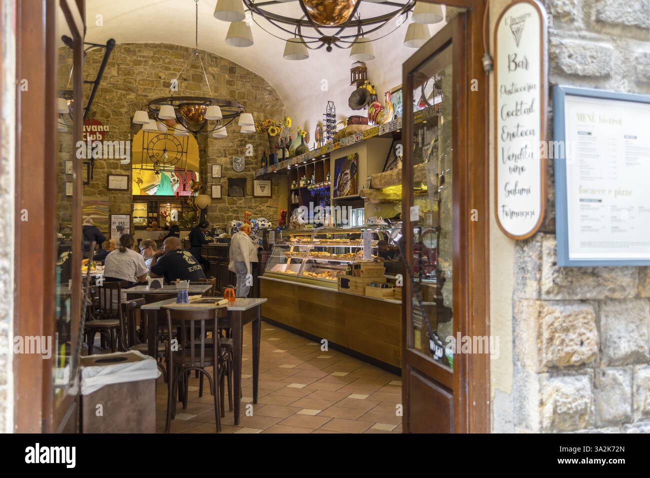 Small restaurant or bar in the historic centre of Volterra, province of ...