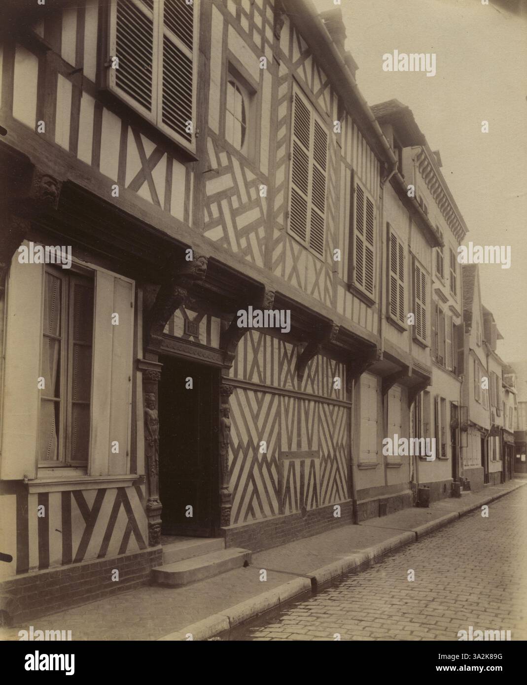 This 1904 photograph by Eugène Atget depicts a residential building at ...