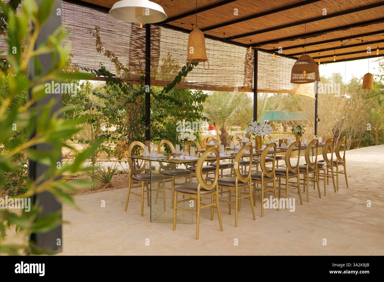 Elegant Outdoor Dining Setup in Saudi Arabia Stock Photo - Alamy