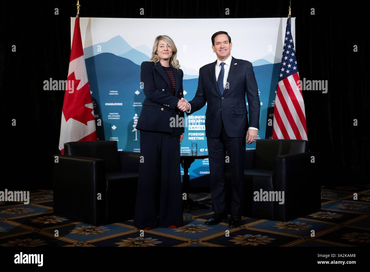 Canadian Foreign Minister Melanie Joly shakes hands with U.S. Secretary of State Marco Rubio ...