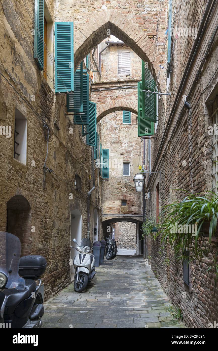 Typical backyard in the historic centre of Siena, Tuscany, Italy ...