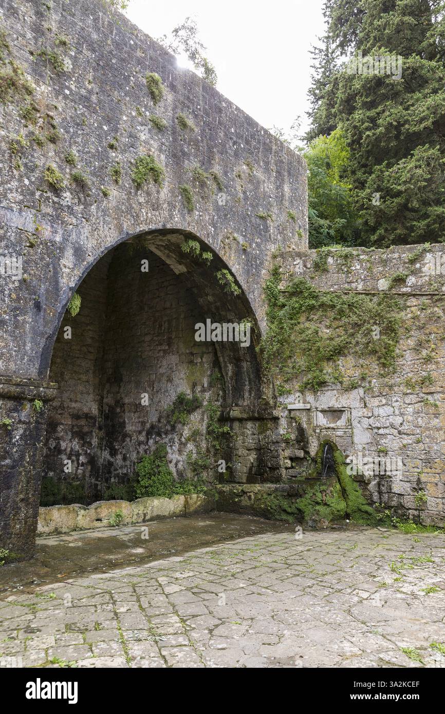 Old covered water basin at the Porta Docciola city gate, Volterra ...