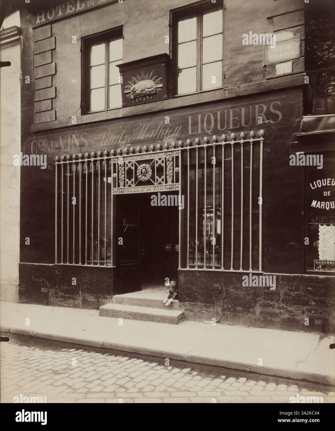 In this 1910 photograph, Eugène Atget captures the storefront of 'À L ...