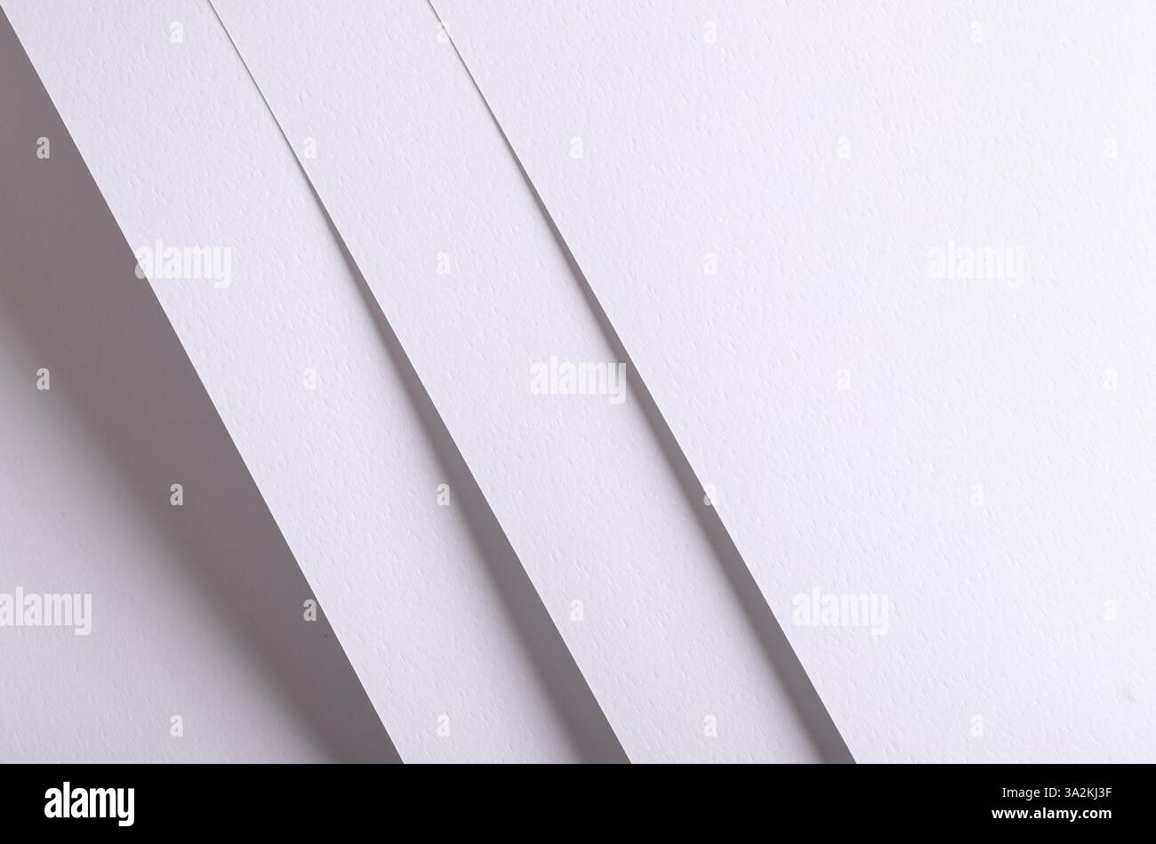 White paper background with a matte texture and a minimalist, geometric ...