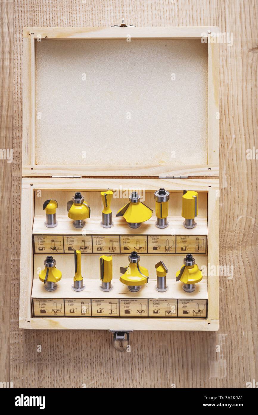 Set of roundover router bits for woodworking in wooden box on board ...