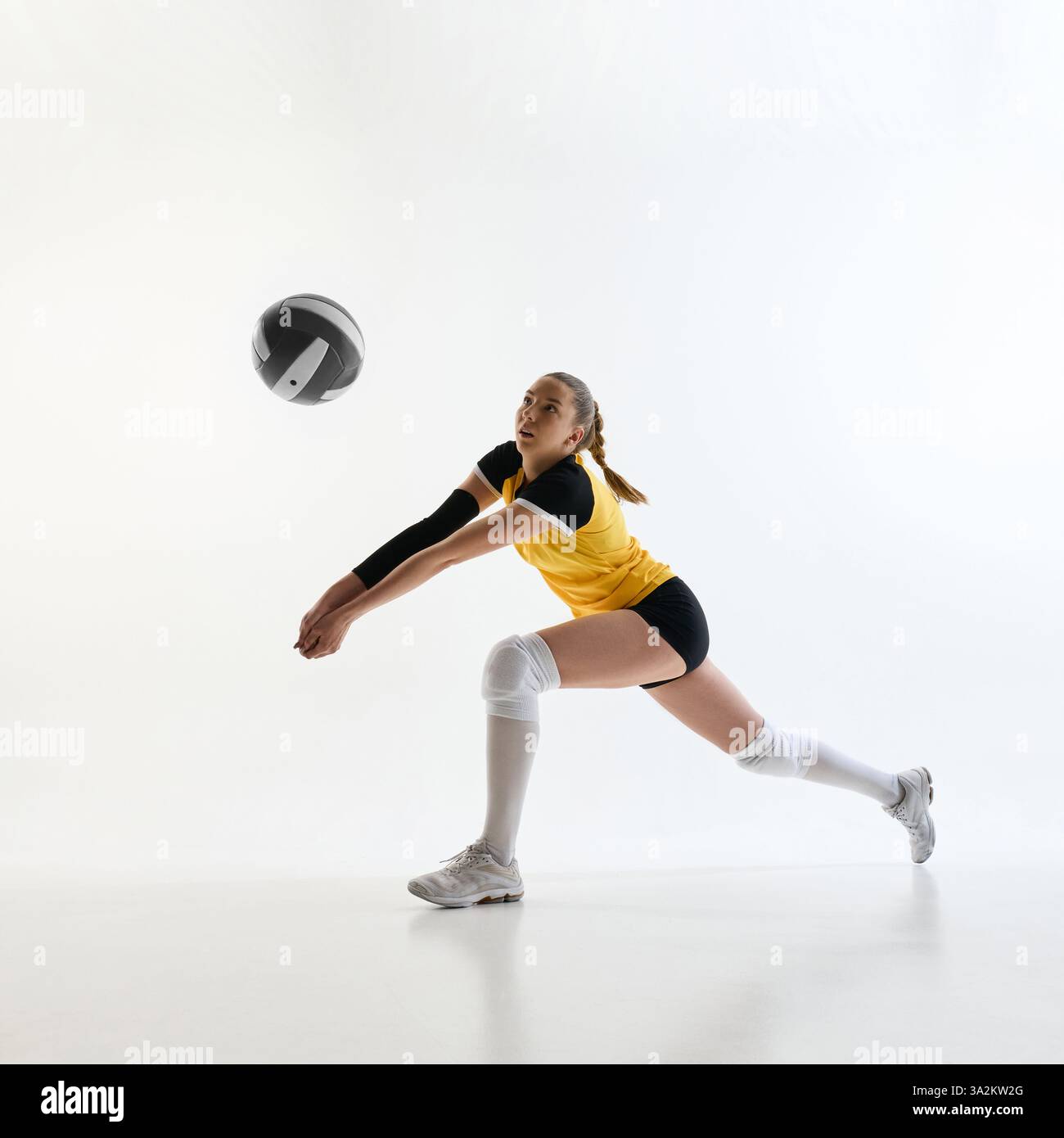Dynamic image of young woman, volleyball player training, growing ...