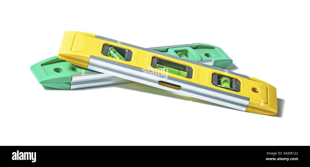 Two construction levels isolated on white background working hand tools ...