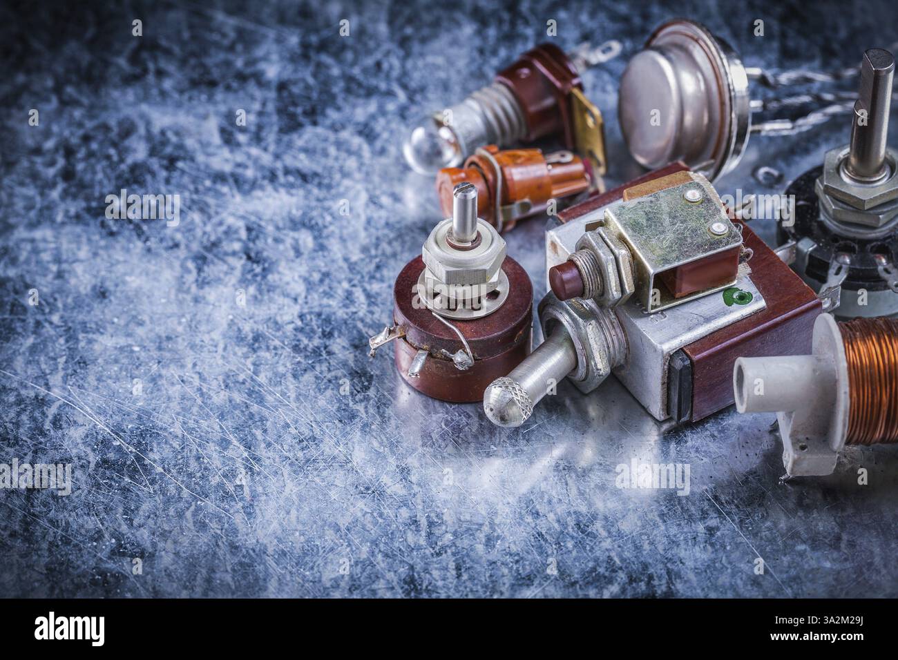Set of electric devices on metallic background vintage electricity ...