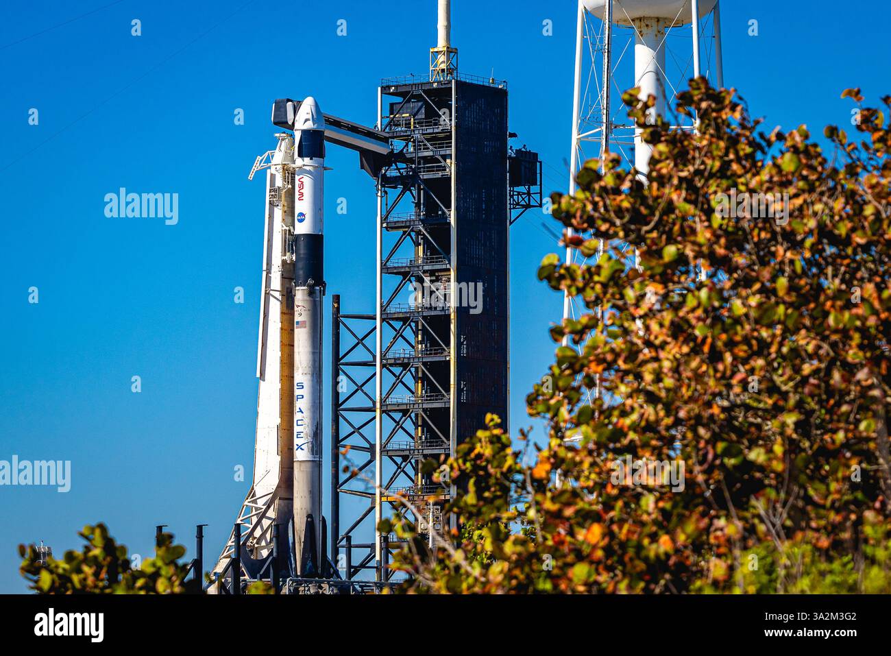 A SpaceX Falcon 9 rocket will launch three astronauts and a cosmonaut ...