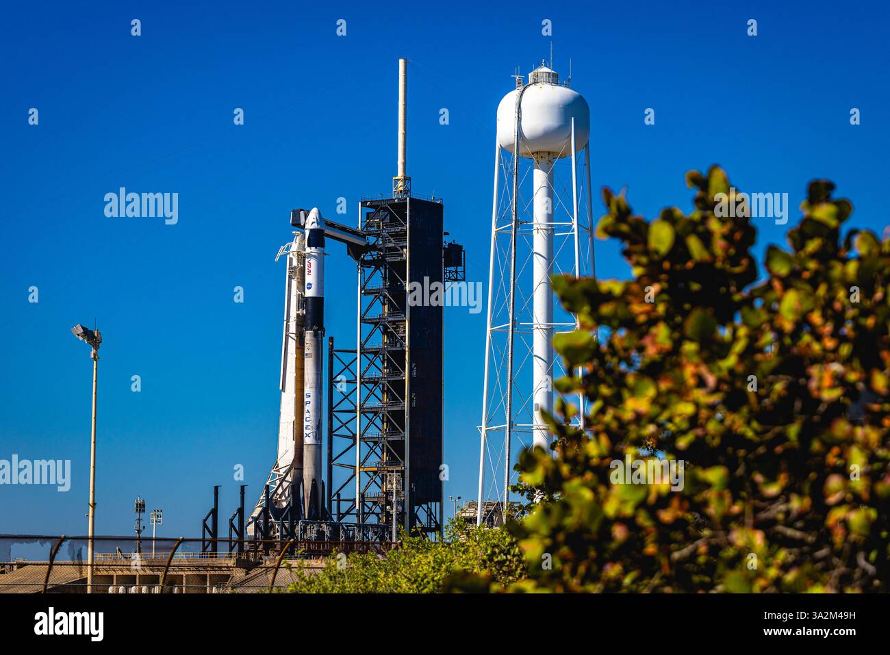 A SpaceX Falcon 9 rocket will launch three astronauts and a cosmonaut ...