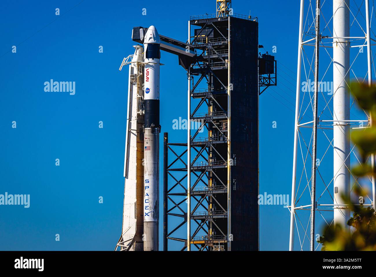 A SpaceX Falcon 9 rocket will launch three astronauts and a cosmonaut ...