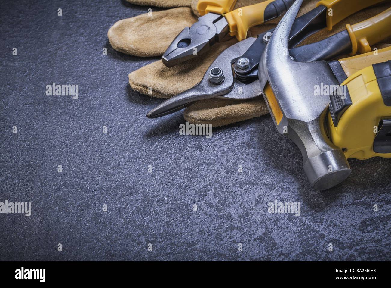 Sharp tin snips pliers leather safety glove tape-measure claw hammer ...