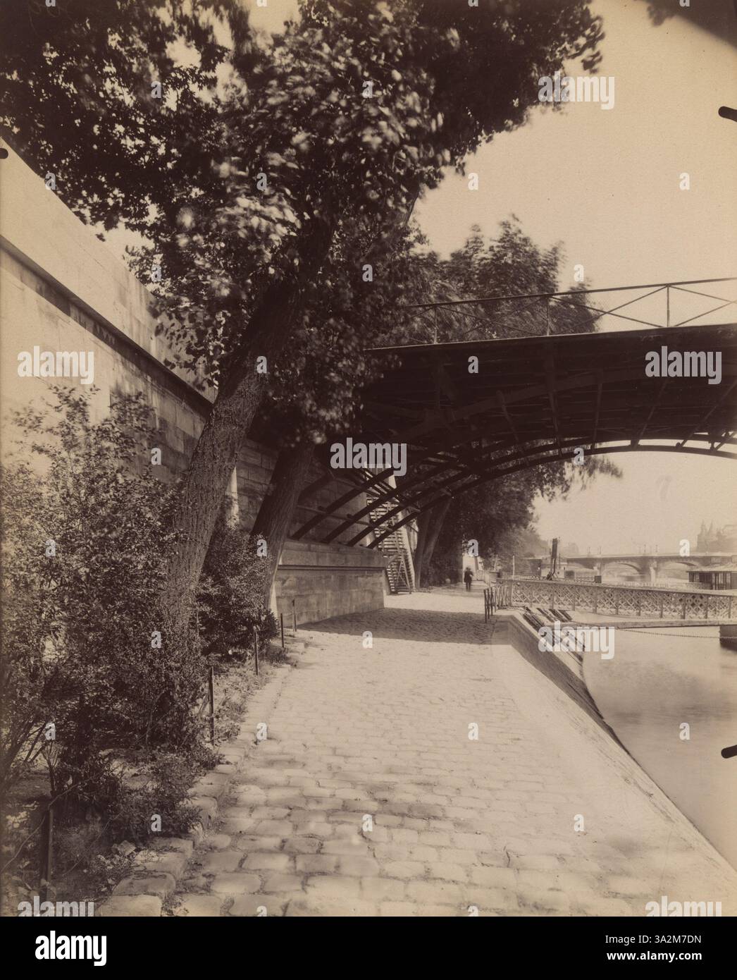 This 1911 photograph by Eugène Atget shows the Port du Louvre in Paris ...