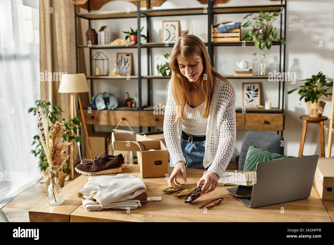 Sorting through clothes and preparing items for donation, promoting a ...