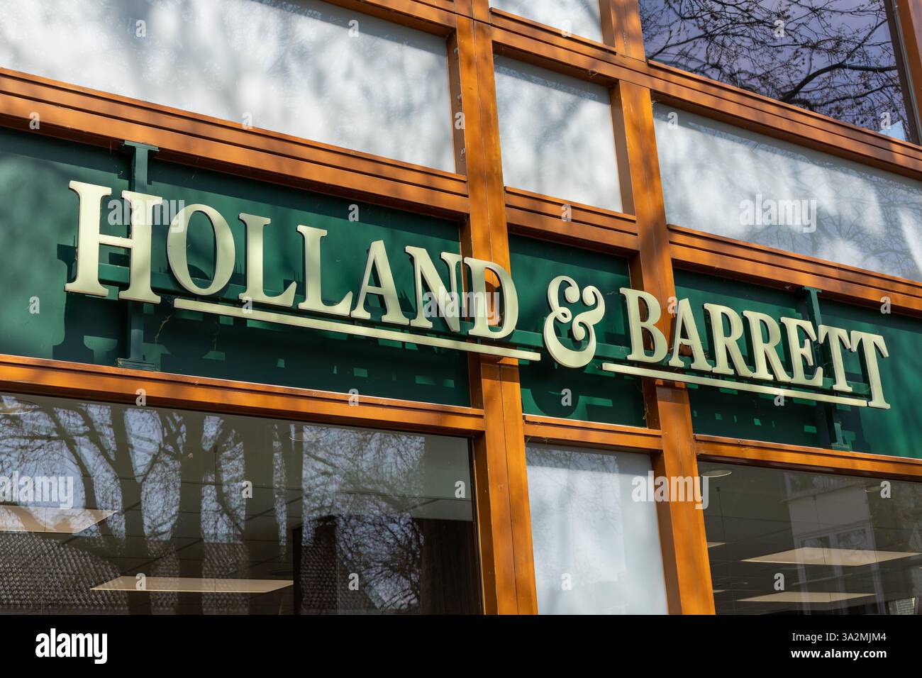 Holland & Barrett sign logo on the shop. A retail chain health food ...
