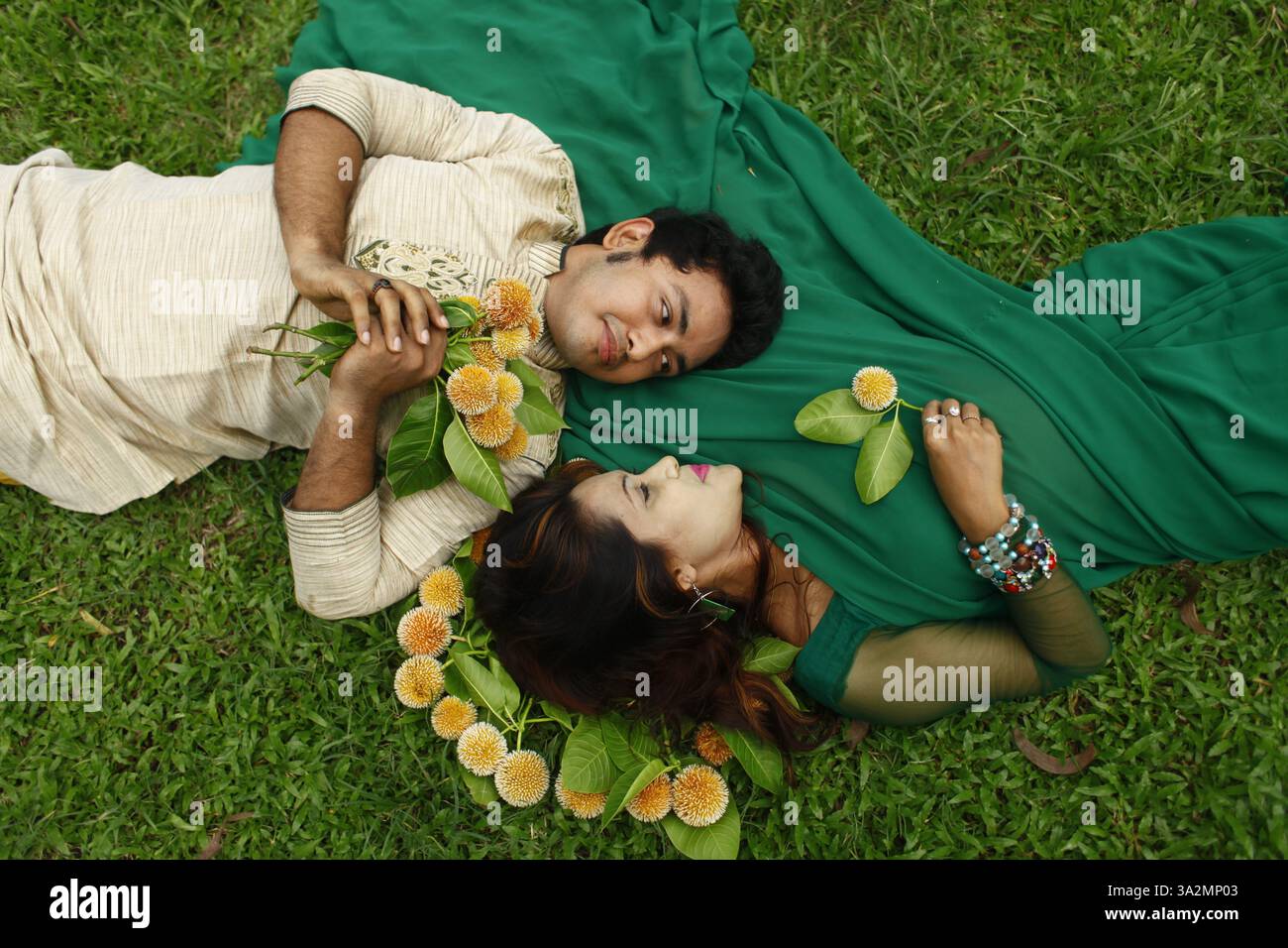 June 25, 2014 - Dhaka, Bangladesh - a Bangladeshi couple present their ...