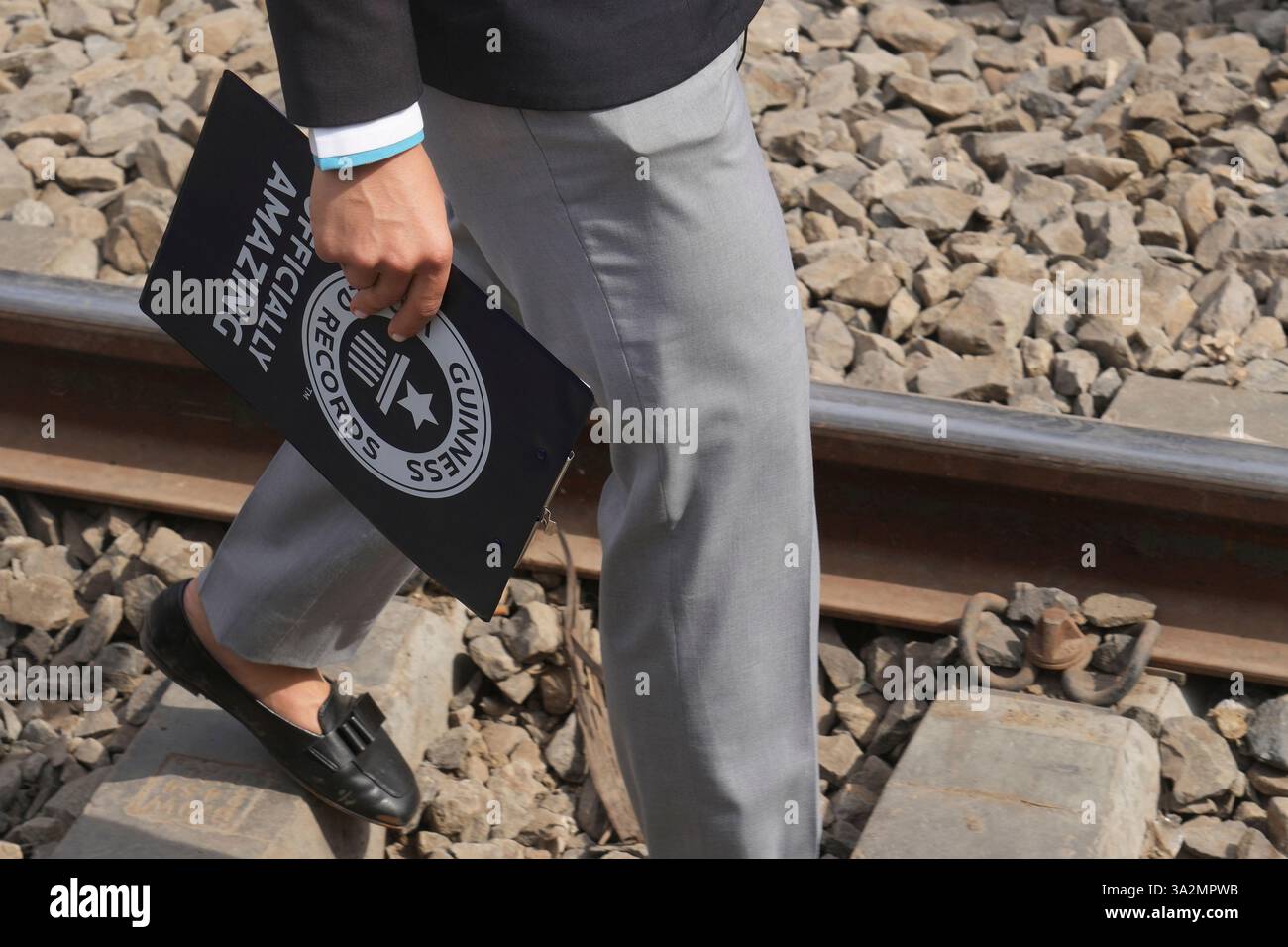 A Guinness World Record observer watches the rail way as Egyptian ...