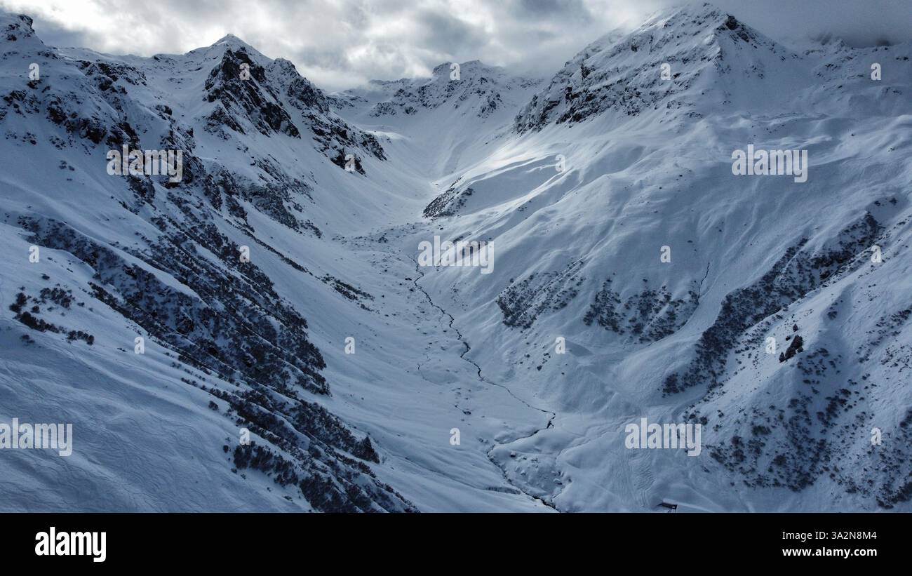 Aerial view of snowy mountains in the Austrian alps Stock Photo - Alamy