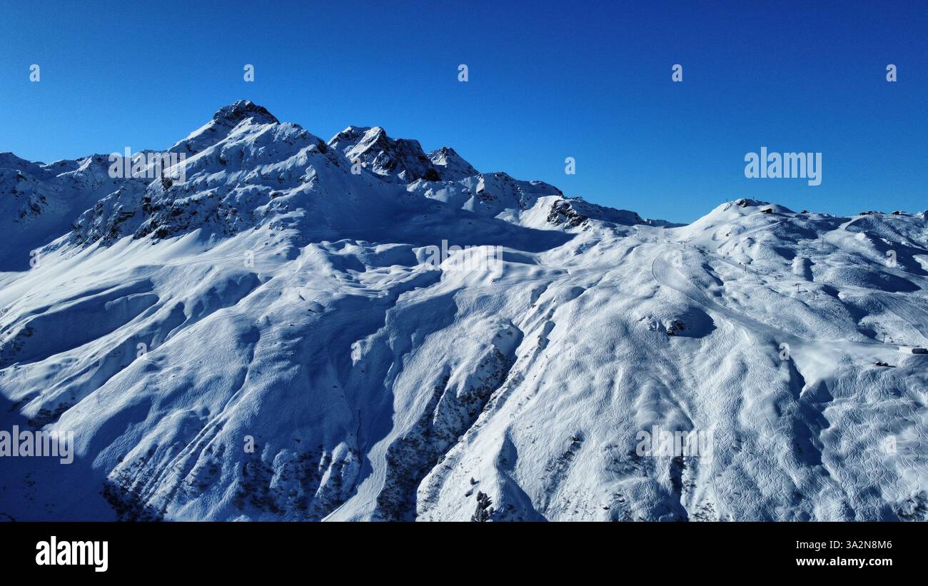 Aerial view of snowy mountains in the Austrian alps Stock Photo - Alamy