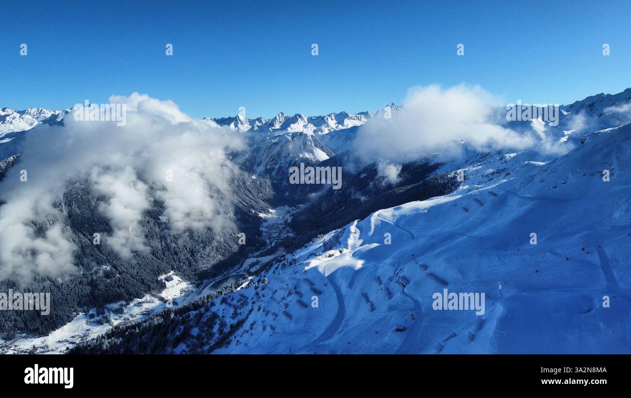 Aerial view of snowy mountains in the Austrian alps Stock Photo - Alamy