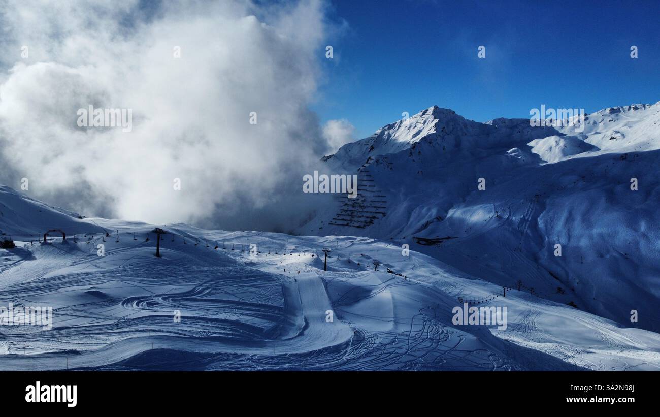 Aerial view of snowy mountains in the Austrian alps Stock Photo - Alamy