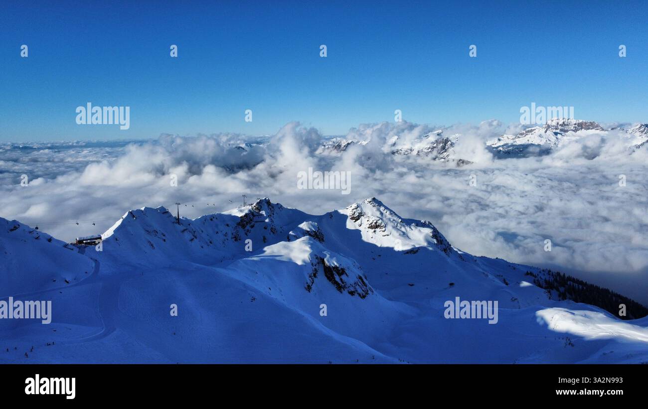Aerial view of snowy mountains in the Austrian alps Stock Photo - Alamy